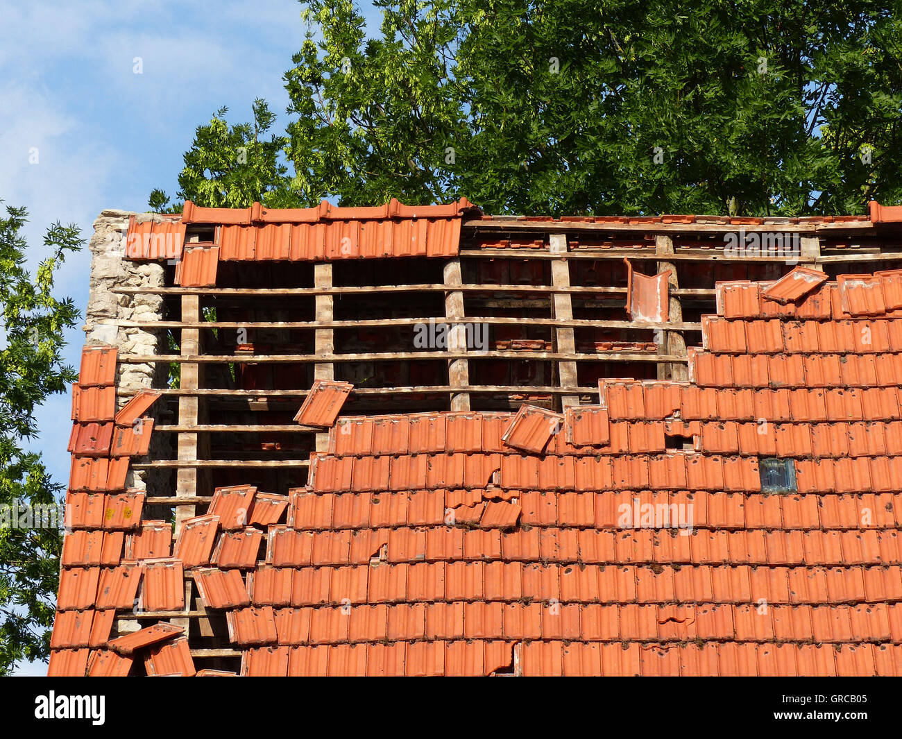 Destroyed Roof After A Storm Stock Photo - Alamy