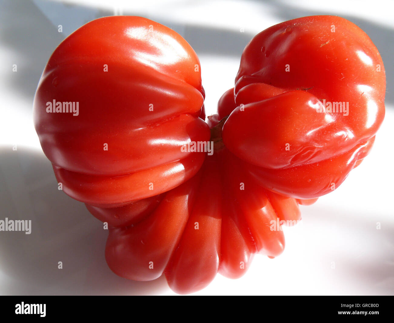 Heart tomato hi-res stock photography and images - Alamy