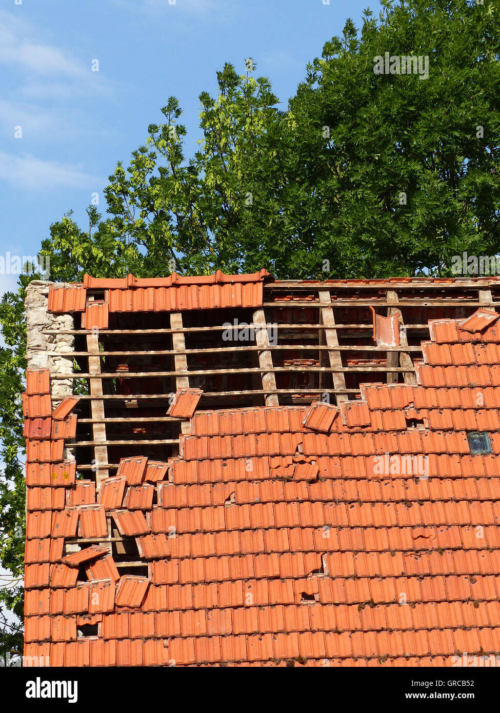 Destroyed Roof After A Storm Stock Photo - Alamy