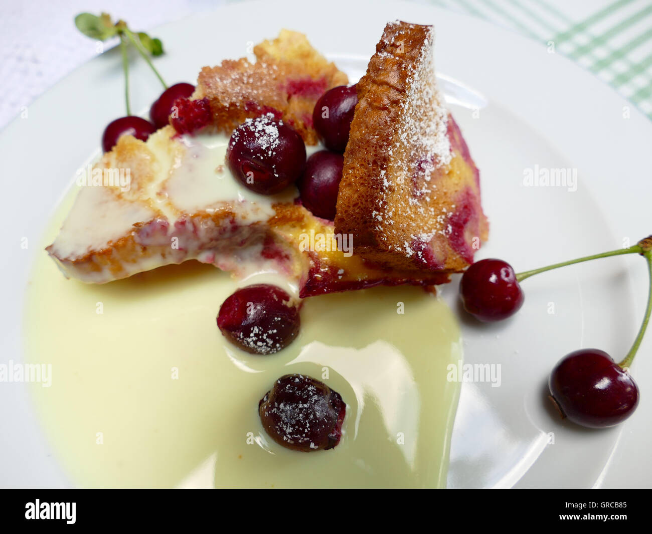 Kirschmichel, Cherry Pudding With Fresh Cherries And Custard Stock ...