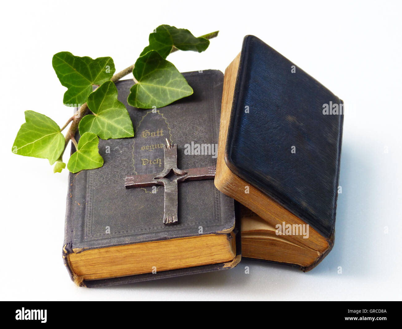 The Bible And Hymn Book With Cross And Ivy Twig Stock Photo - Alamy