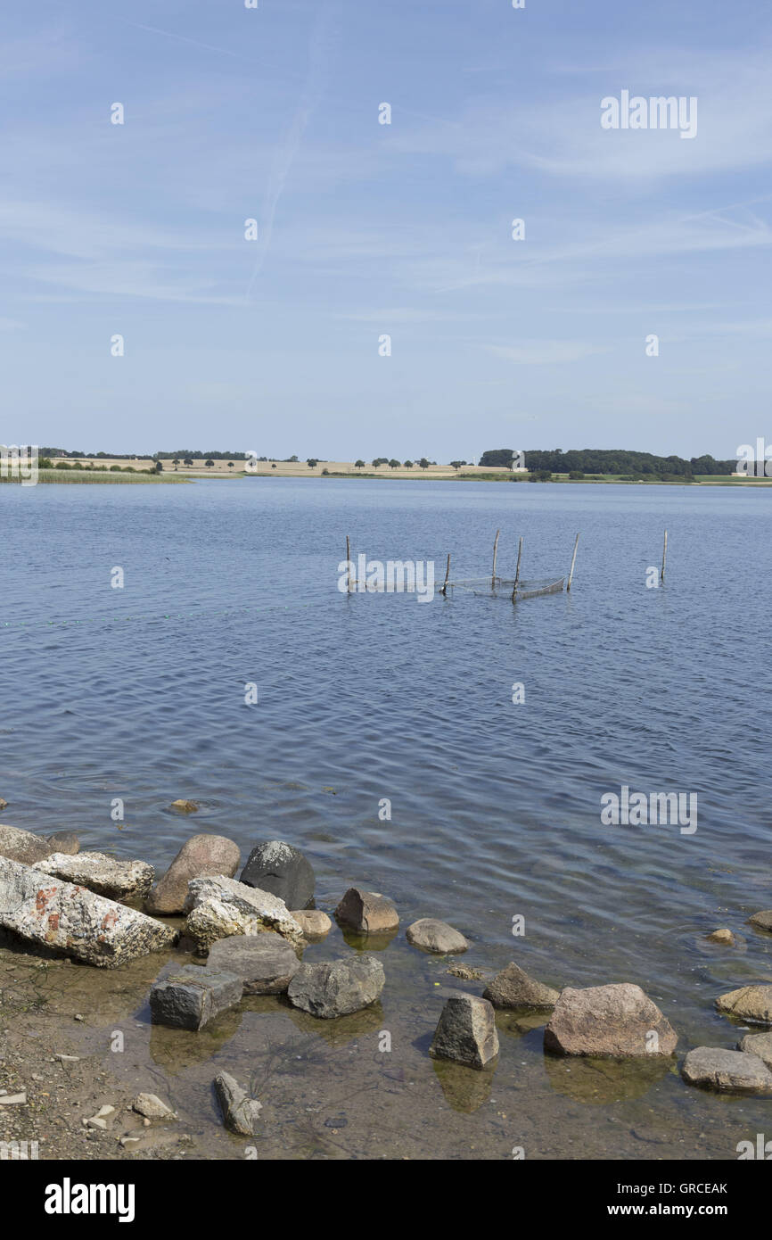 Stones On The Beach Of A Lake In Stege Moen Stock Photo - Alamy