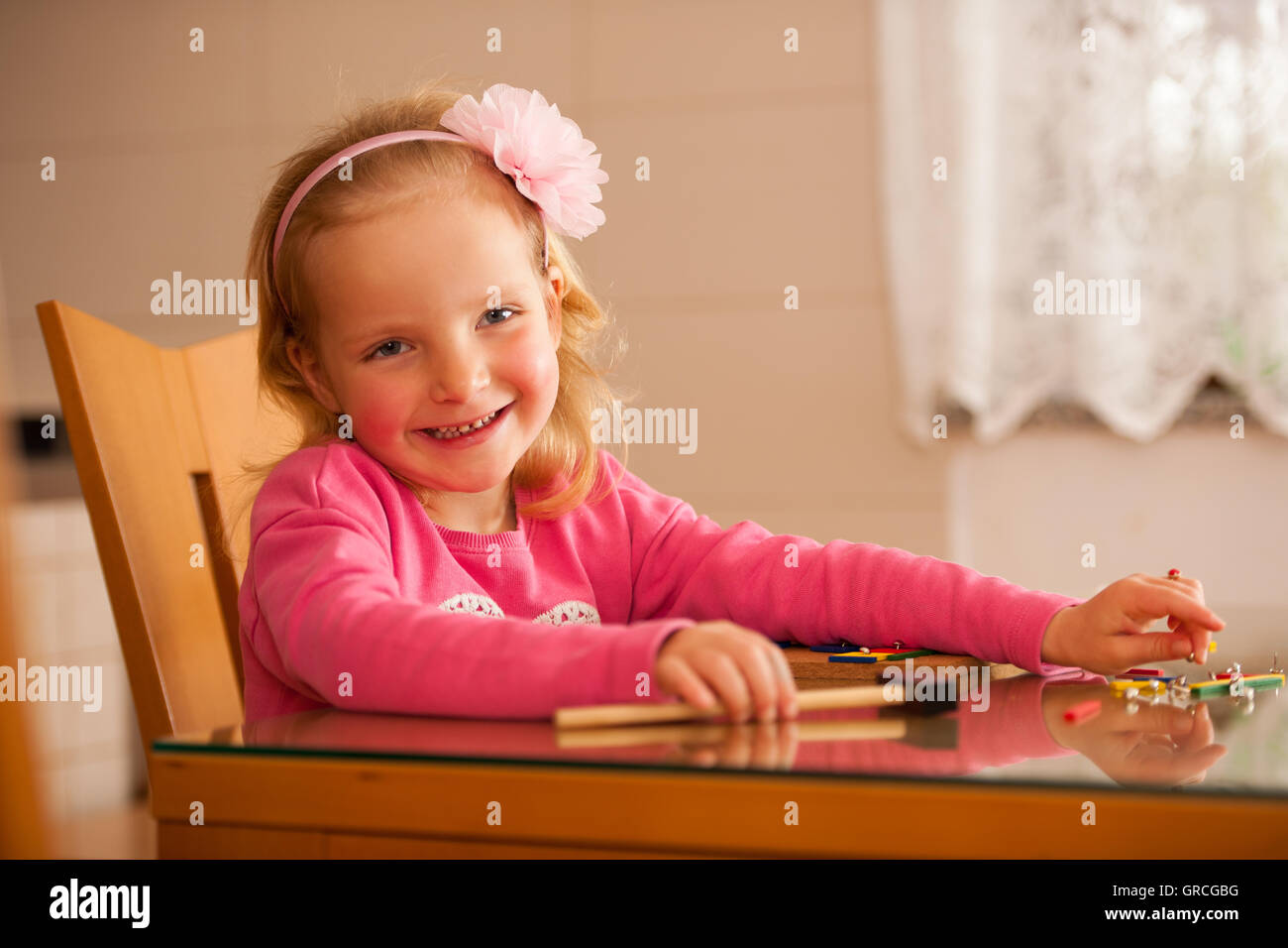 Girl building lego hi-res stock photography and images - Alamy