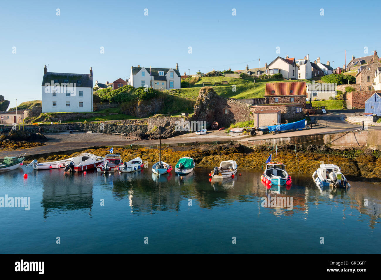 The small fishing village of St Abbs, Berwickshire Scottish Borders UK ...