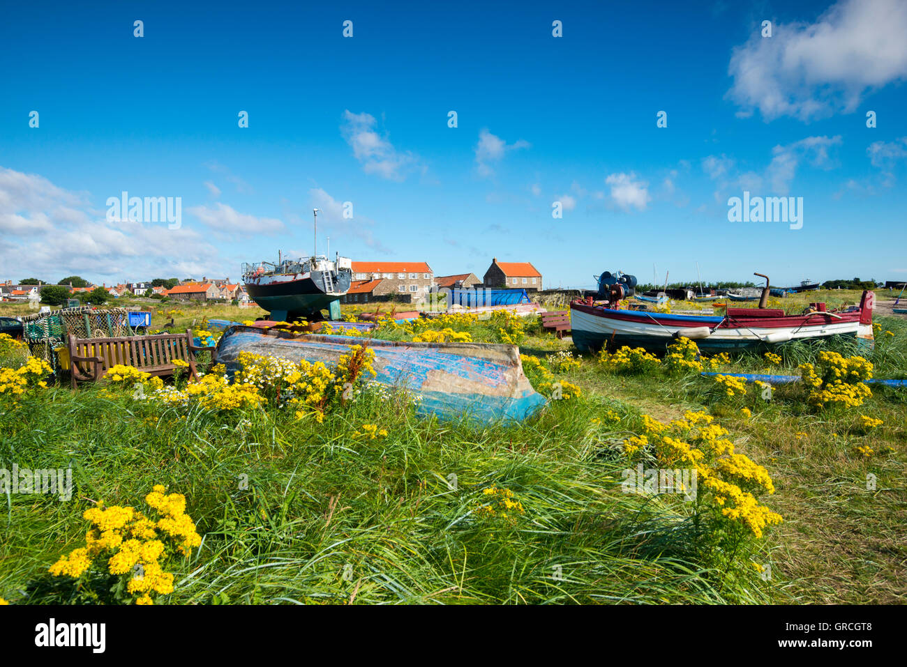 Fishing boats holy island beach hi-res stock photography and images - Alamy