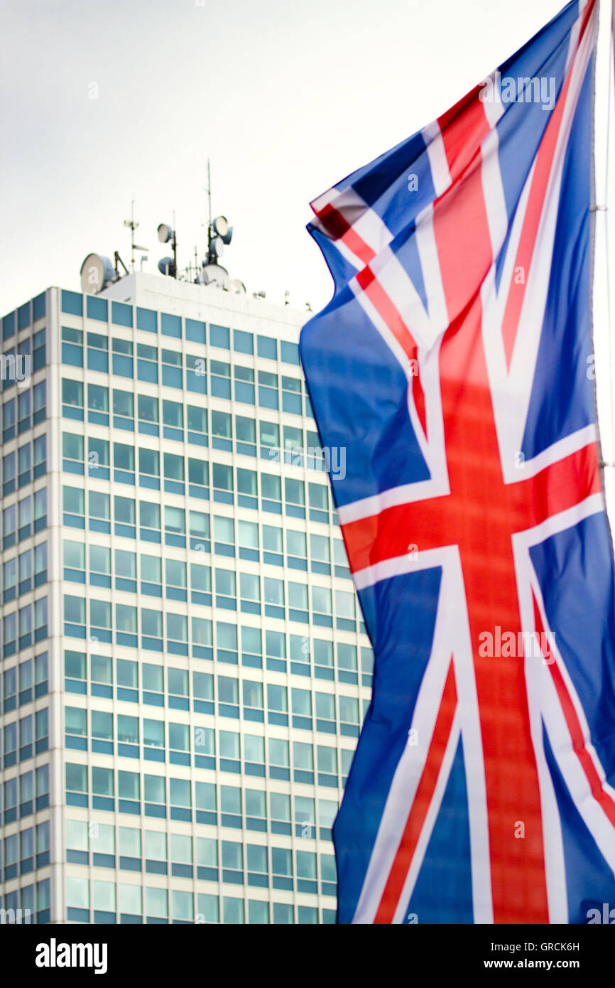 Flag Of Uk Against High-Rise Building, Union Jack Stock Photo - Alamy