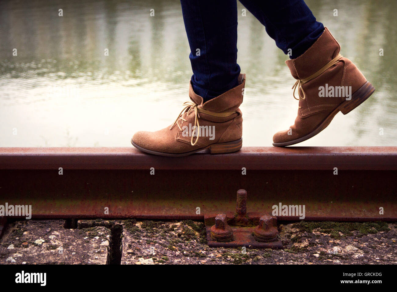 Balancing On Railway Track Stock Photo - Alamy