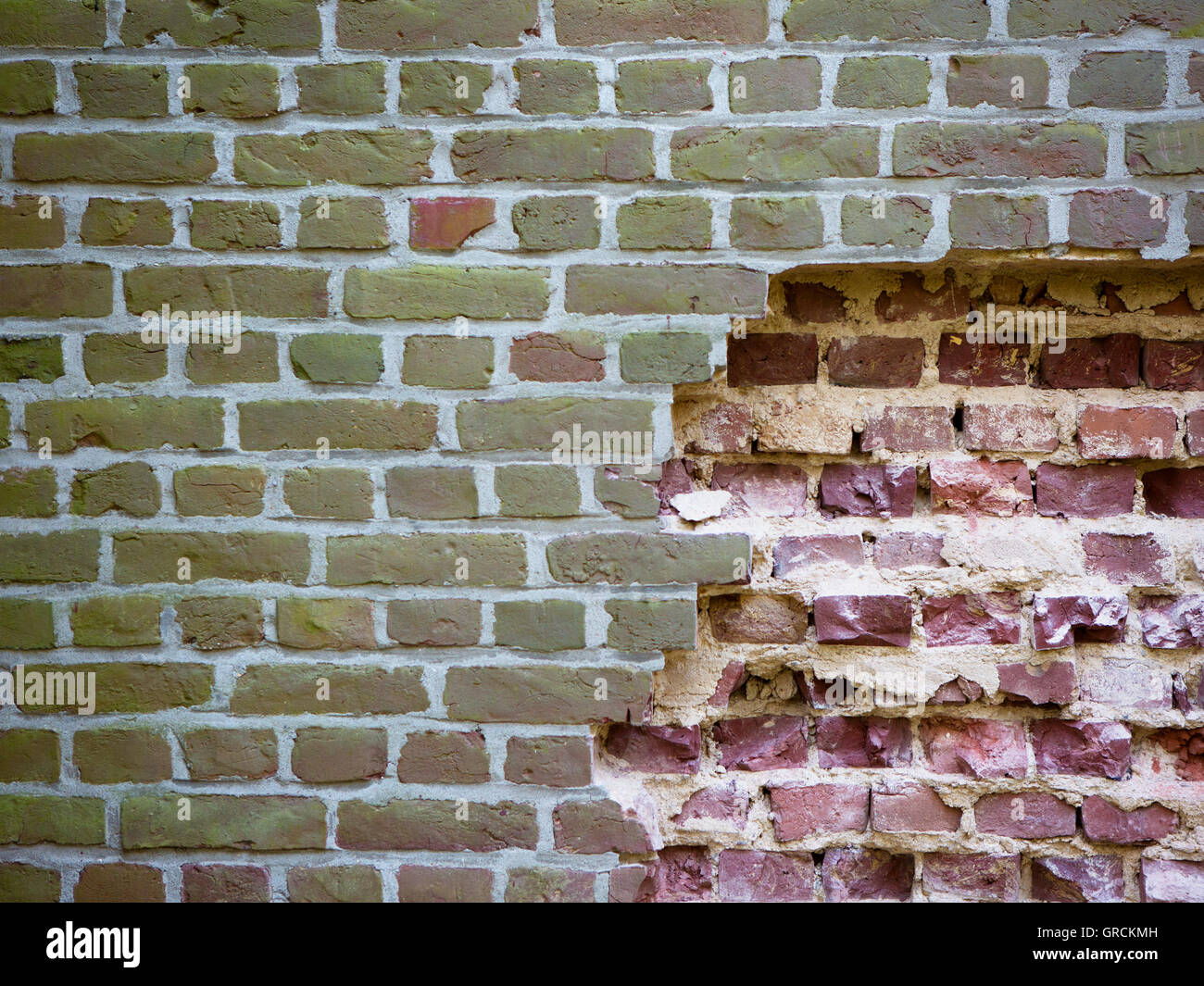 Brick Wall, Destroyed In Parts Stock Photo - Alamy