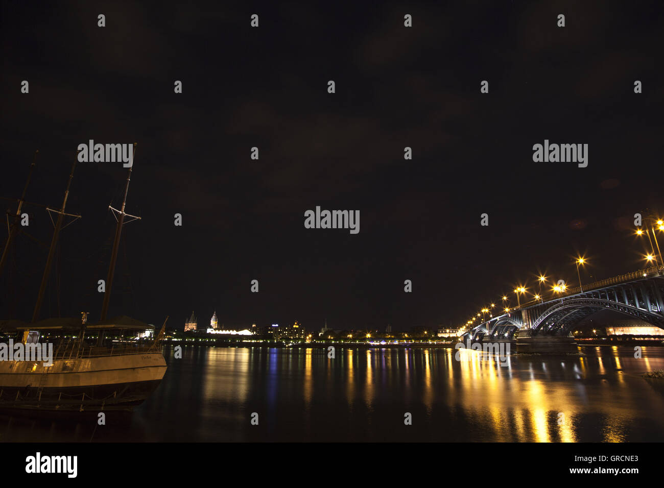 Mainz At Night With Theodor Heuss Bridge And Ship Stock Photo - Alamy