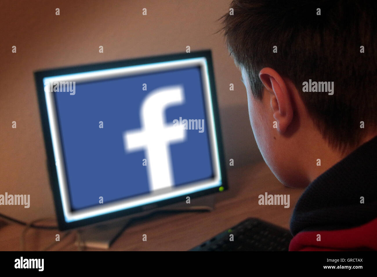 Teenager Surfing On The Web And Using Facebook Stock Photo - Alamy