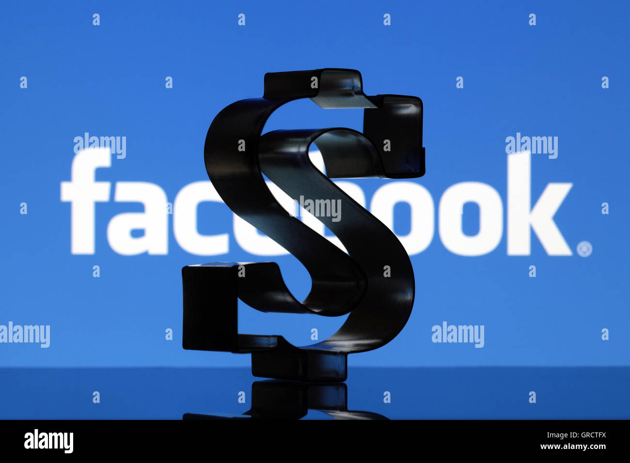 Us Dollar Sign With Facebook Sign Stock Photo - Alamy
