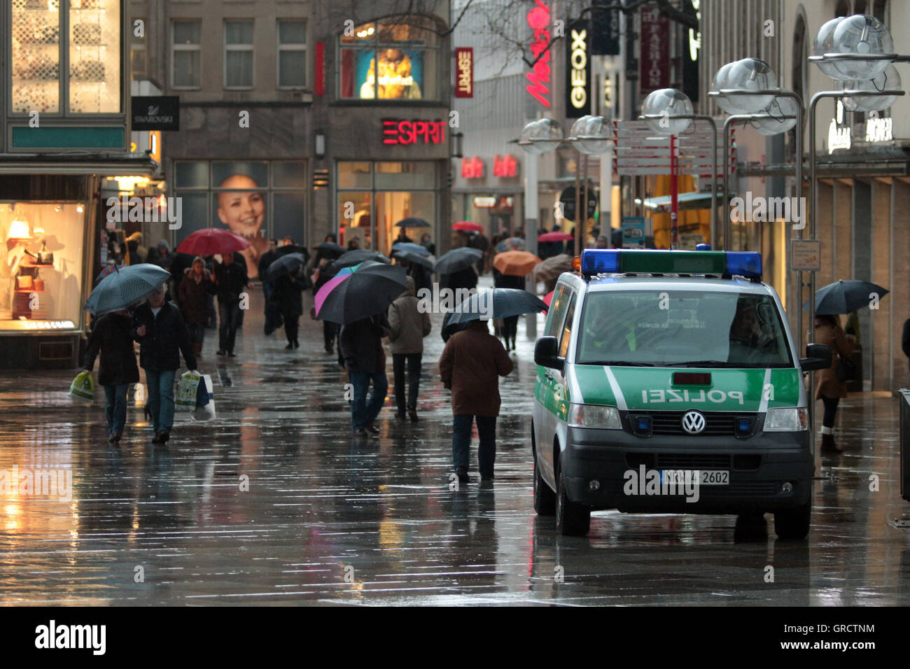 Police Car In Operation In Downtown Cologne Stock Photo - Alamy
