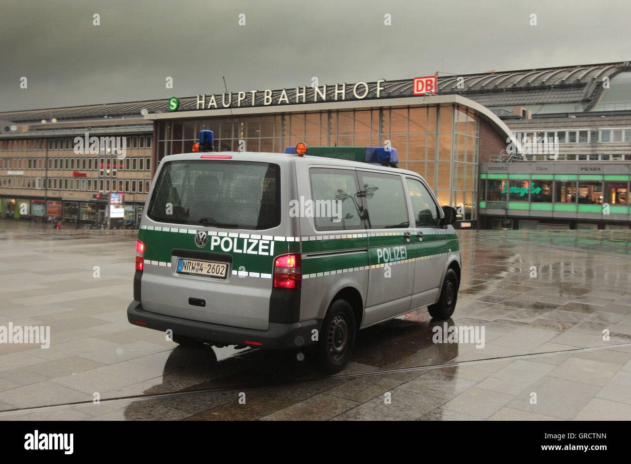 Police Car In Operation In Downtown Cologne Stock Photo - Alamy