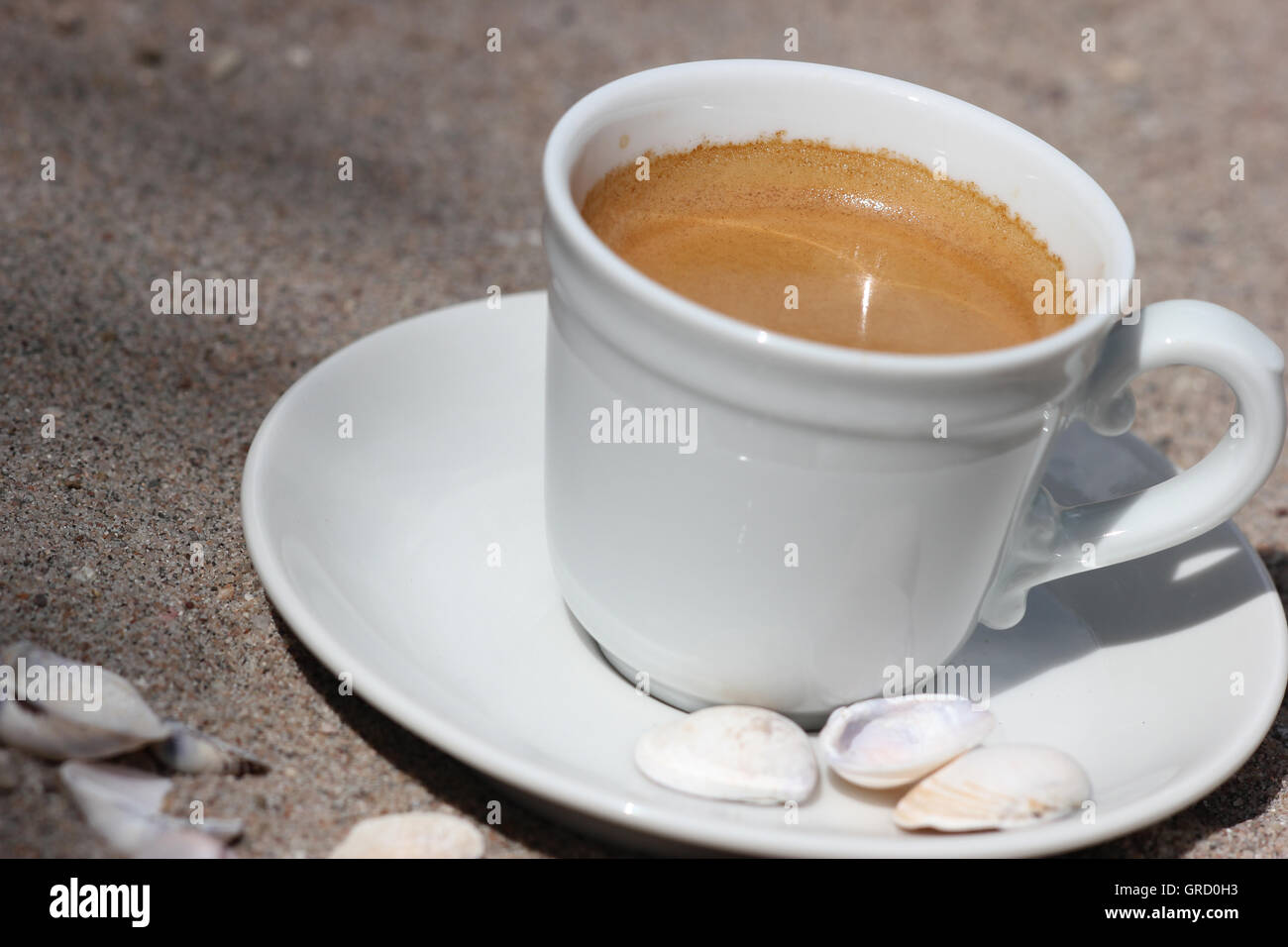 Beach Feeling, Espresso Coffee On The Beach Stock Photo - Alamy