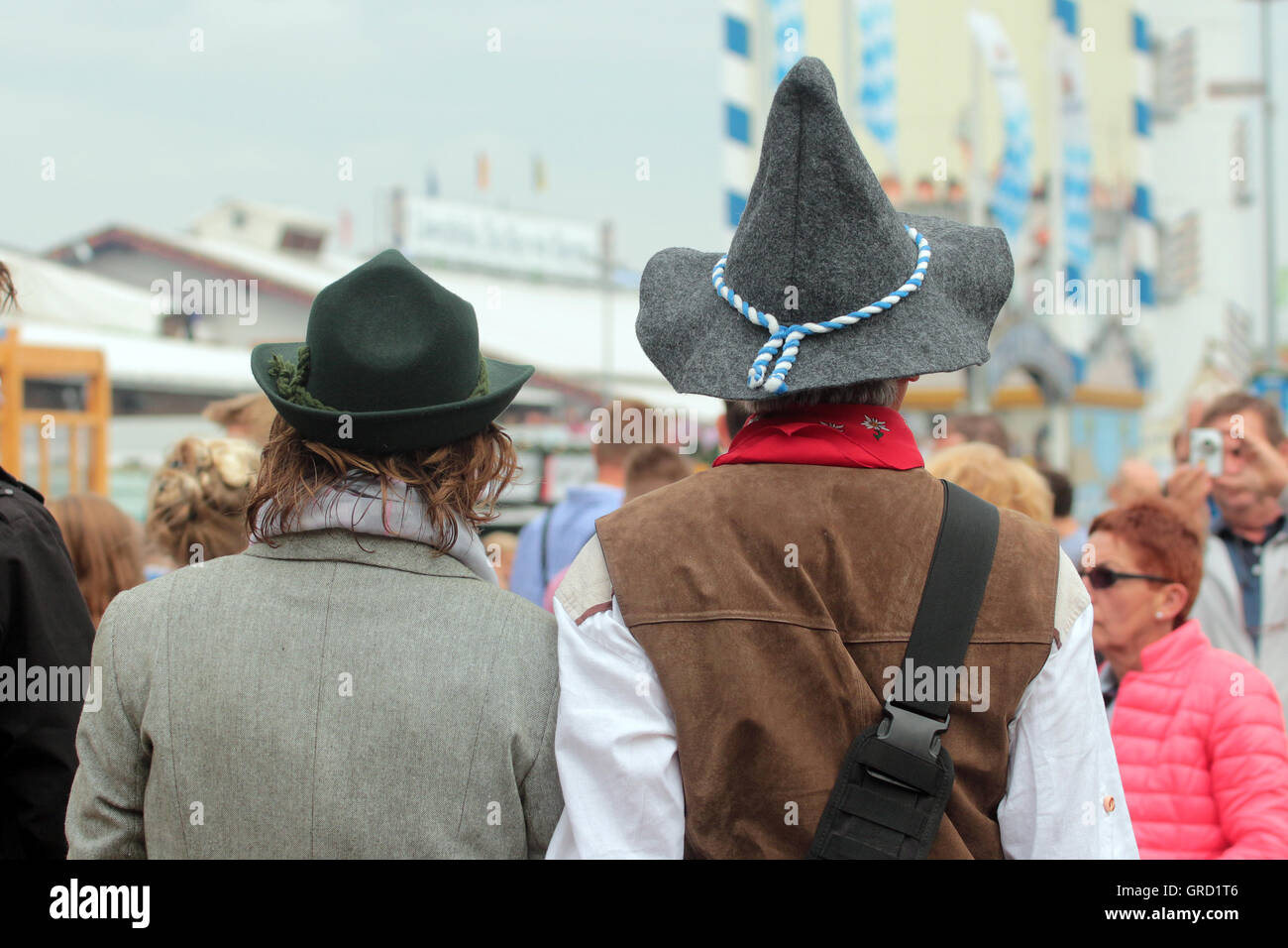 Visitors Of Munich Oktoberfest With Tradtional And Fun Hat Stock Photo ...