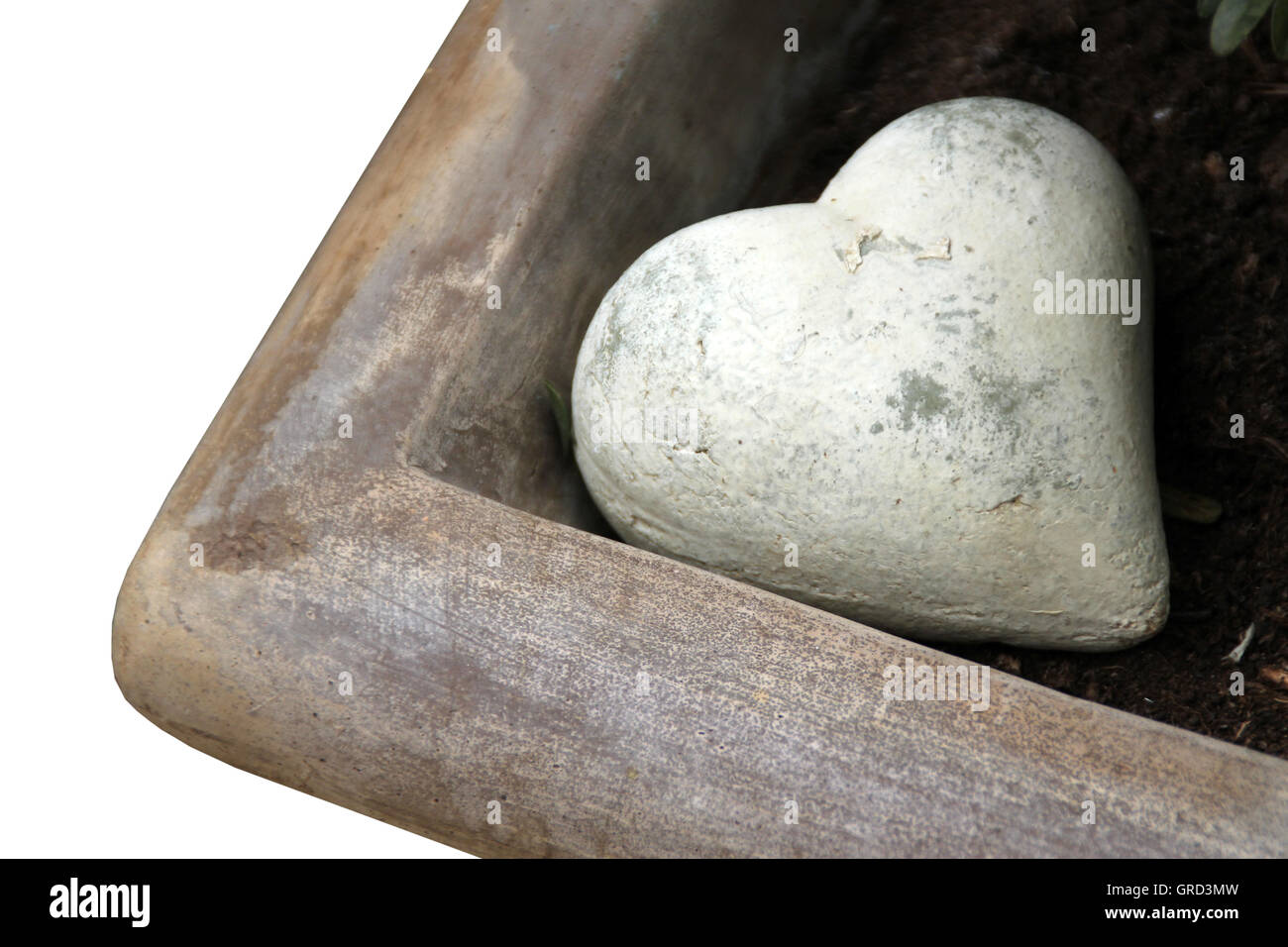 Heart Of Stone In A Flower Pot Stock Photo - Alamy