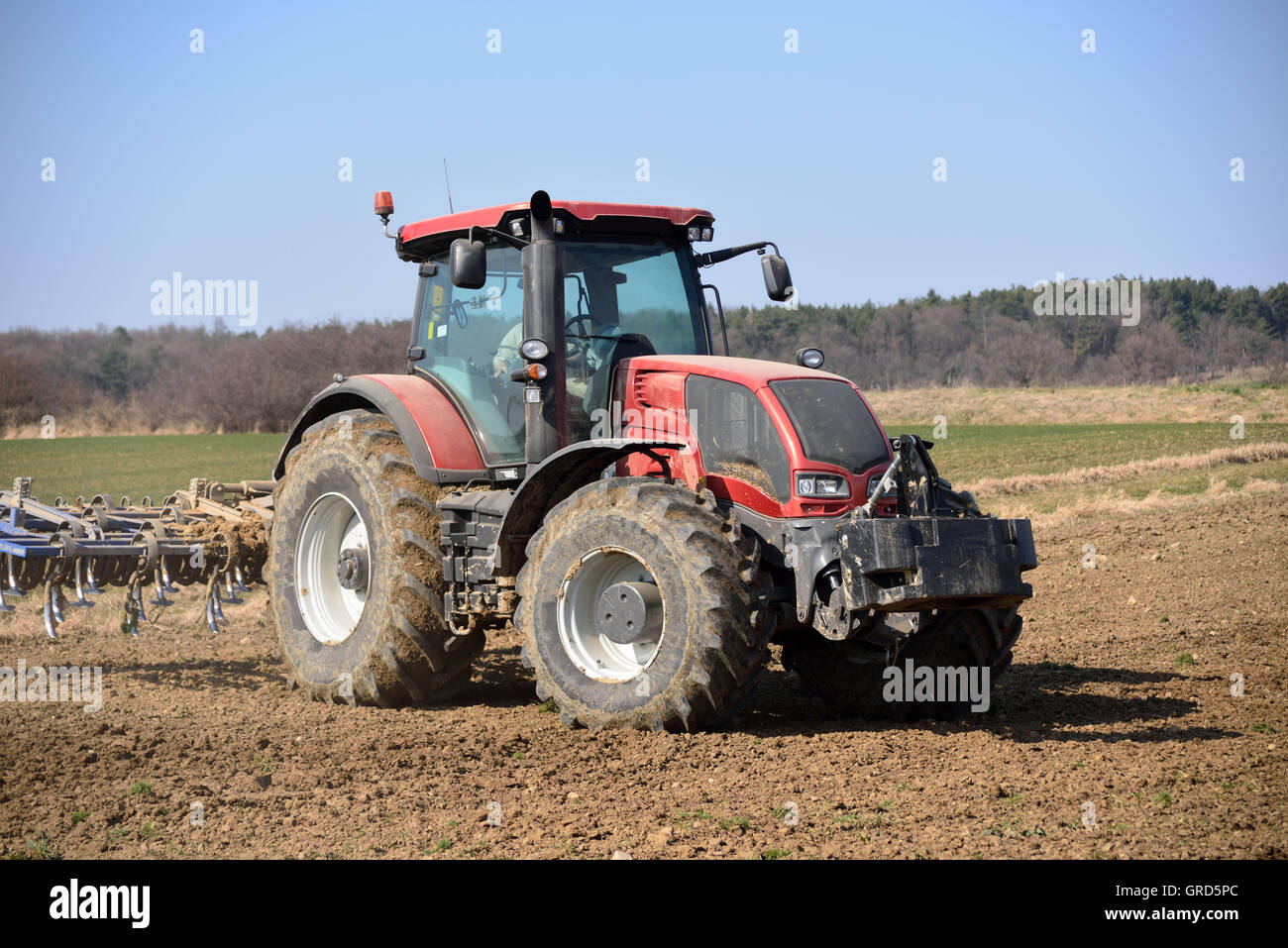 Farmer in red tractor hi-res stock photography and images - Alamy
