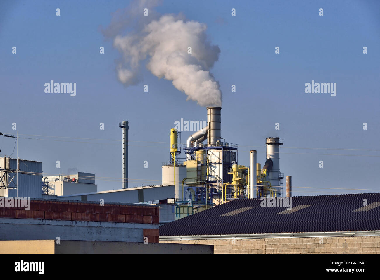 Factory With Smoking Chimney Stock Photo - Alamy