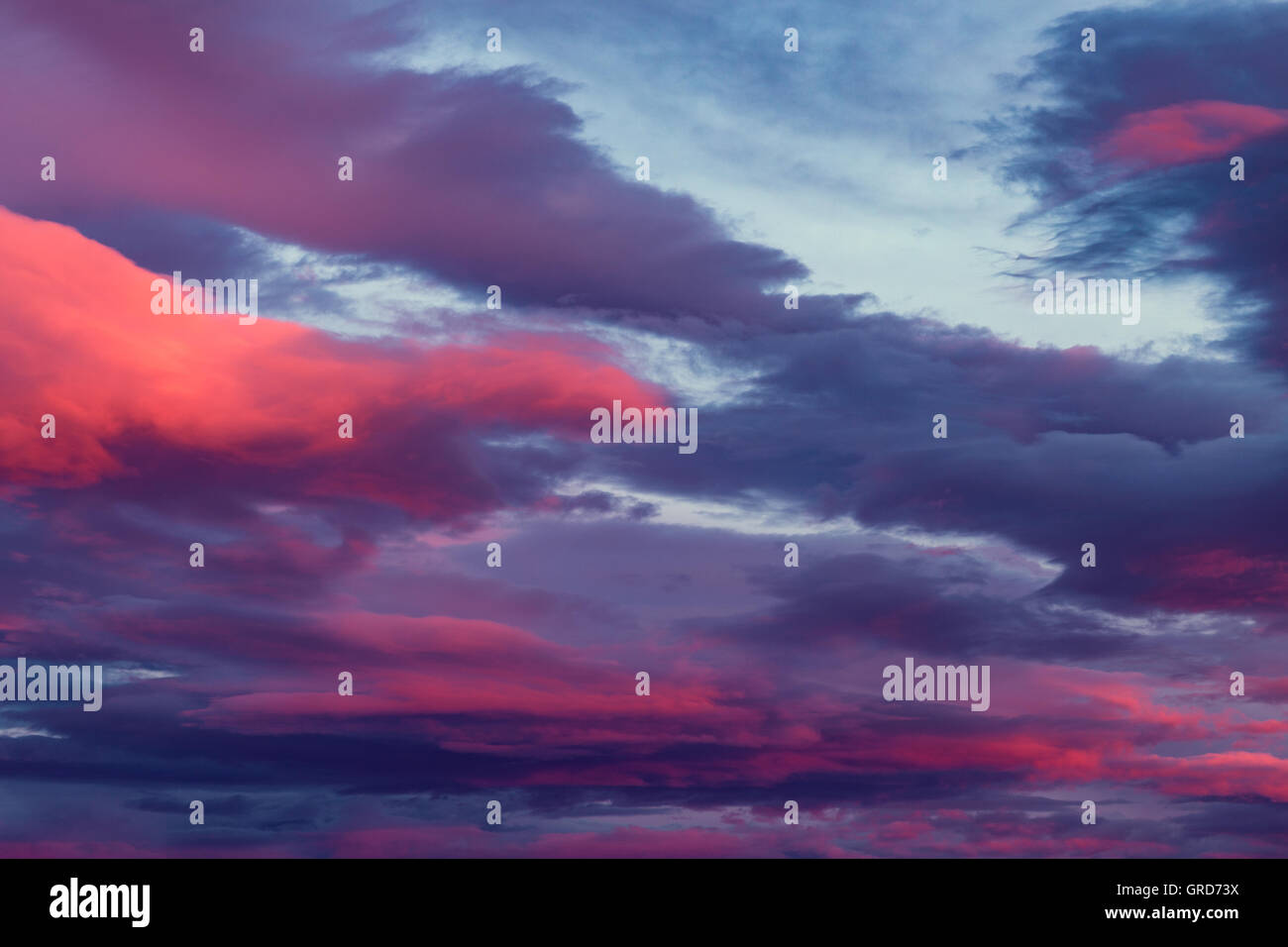 Saturated Red and Purple Clouds on Twilght Sky Background Stock Photo ...