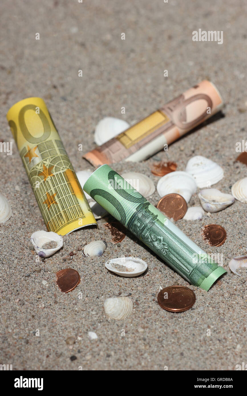 Money, Banknotes, Coins And Shells In The Sand, Symbolizing Vacation ...
