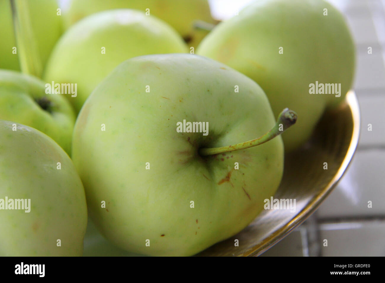 Grain Apples On A Plate Stock Photo - Alamy