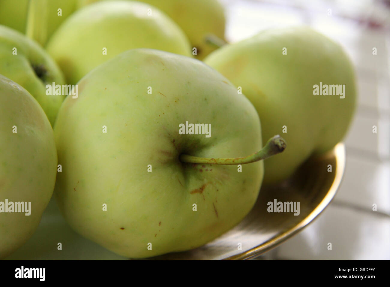 Grain Apples On A Plate Stock Photo - Alamy