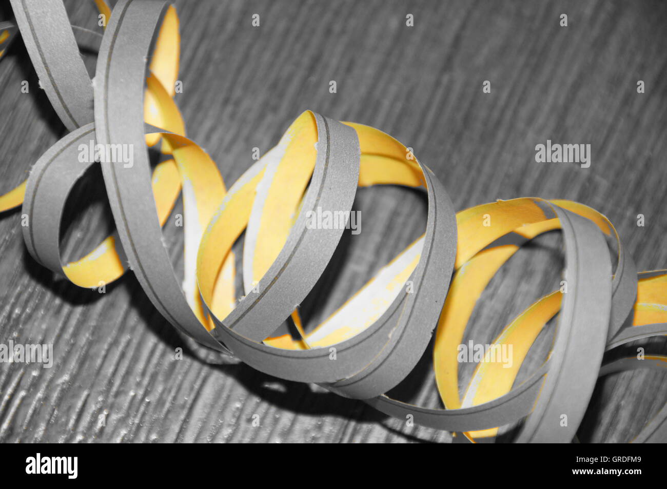 Gray And Yellow Paper Streamer Stock Photo - Alamy