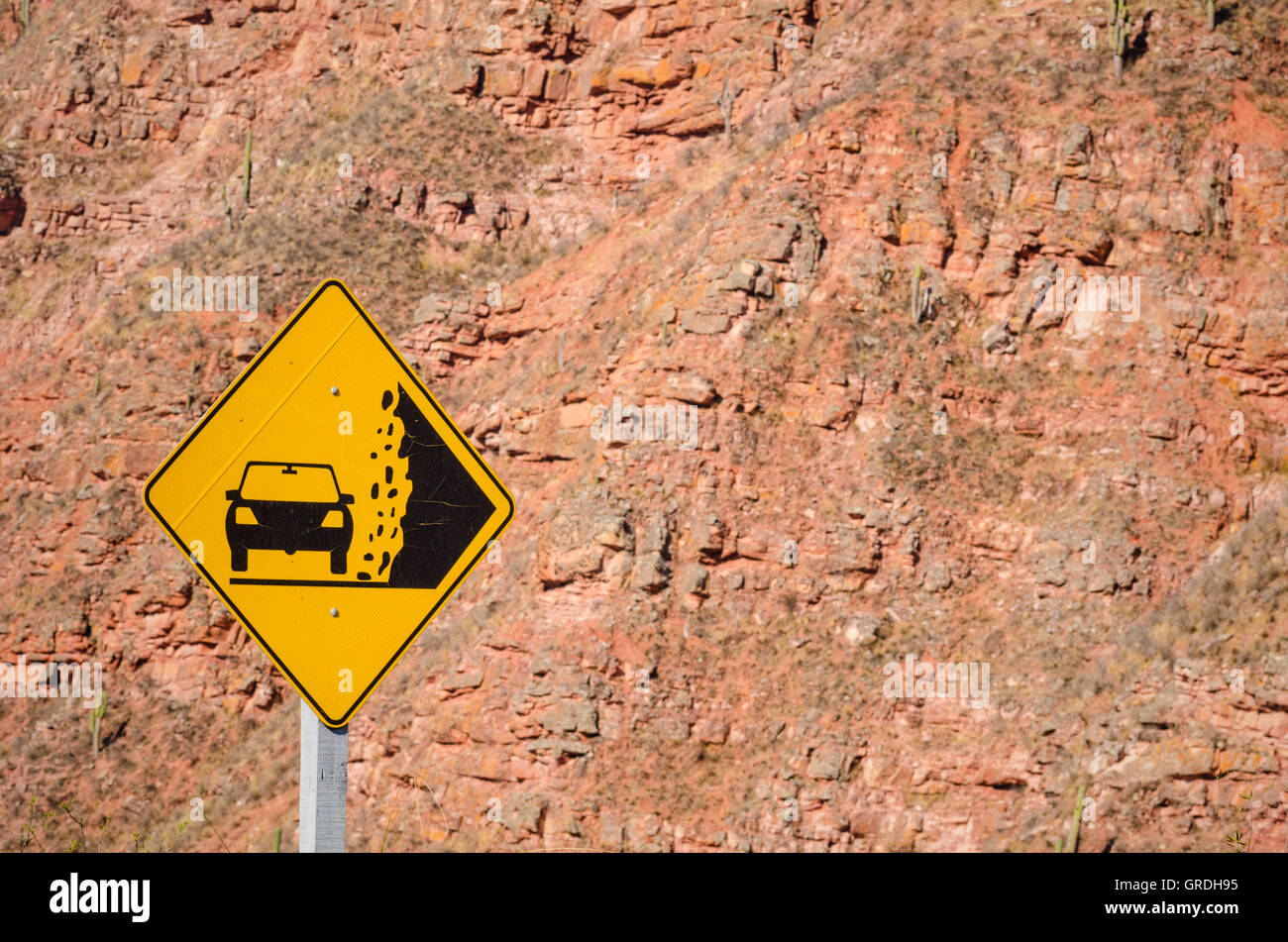 Traffic sign warning of landslide risk Stock Photo - Alamy