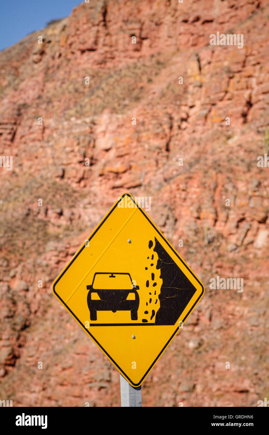 Traffic sign warning of landslide risk Stock Photo - Alamy