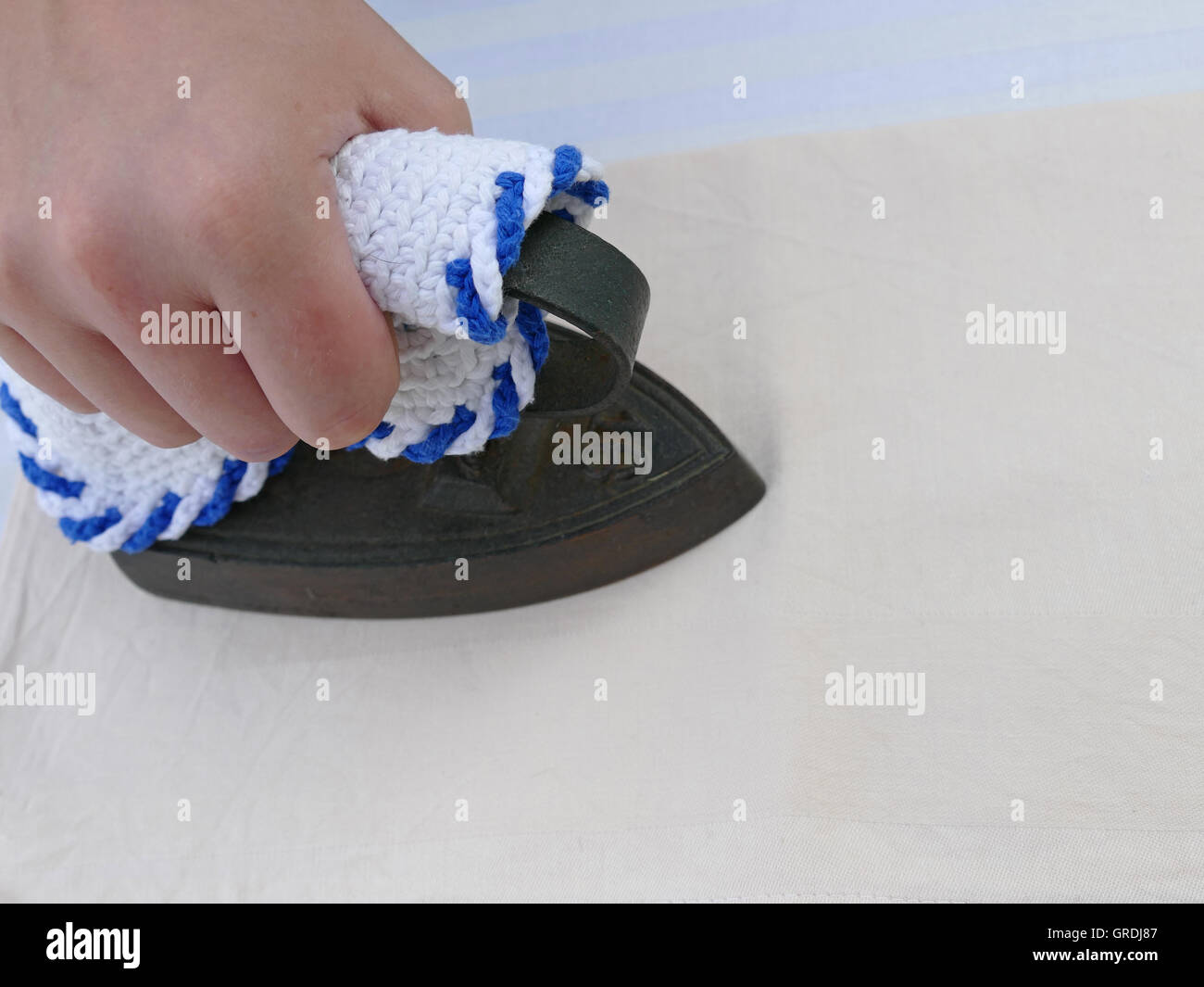 Pressing linen hi-res stock photography and images - Alamy