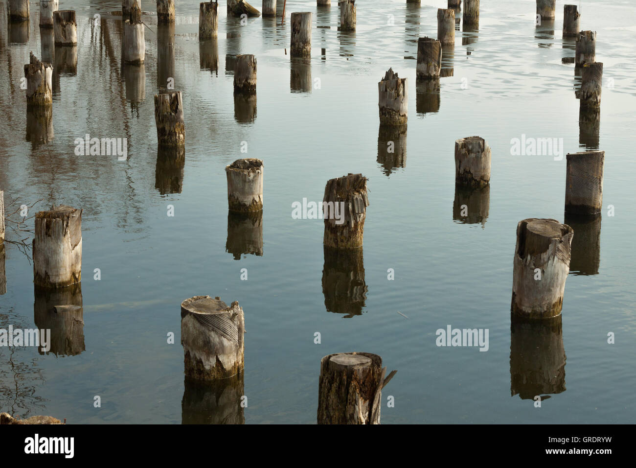 Old Pillars Of A Bridge Above The Water Of A Lake Stock Photo - Alamy