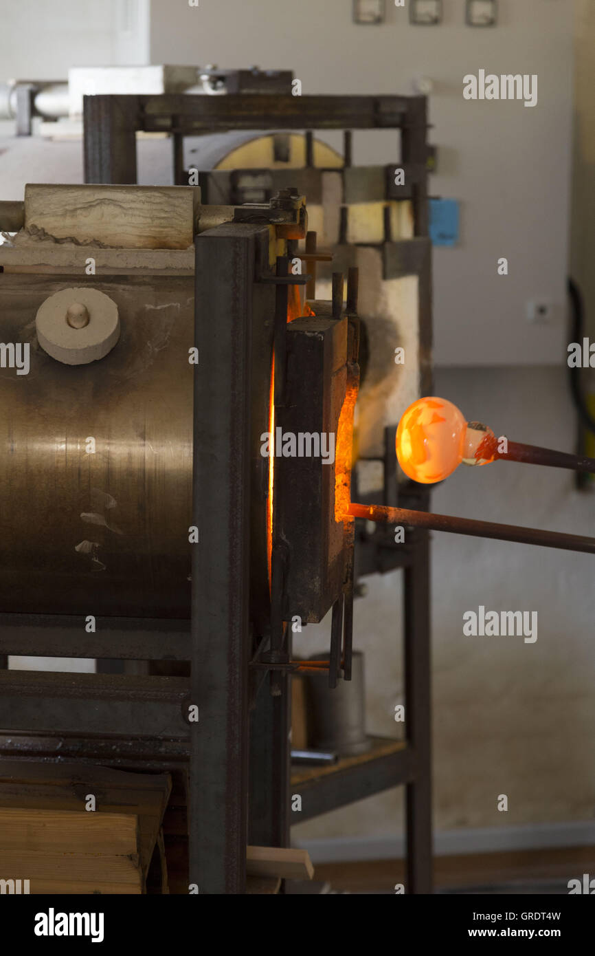 Opening Of A Glass Furnace In A Small Glassblowing Stock Photo - Alamy