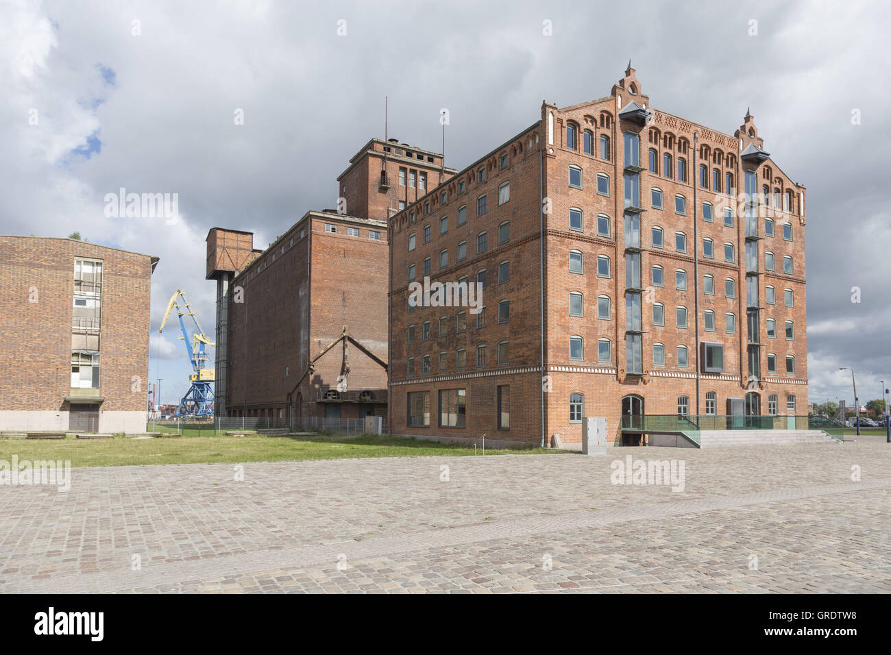 Big, Old Harbor Warehouse Brick Building With Many Windows In The Port ...