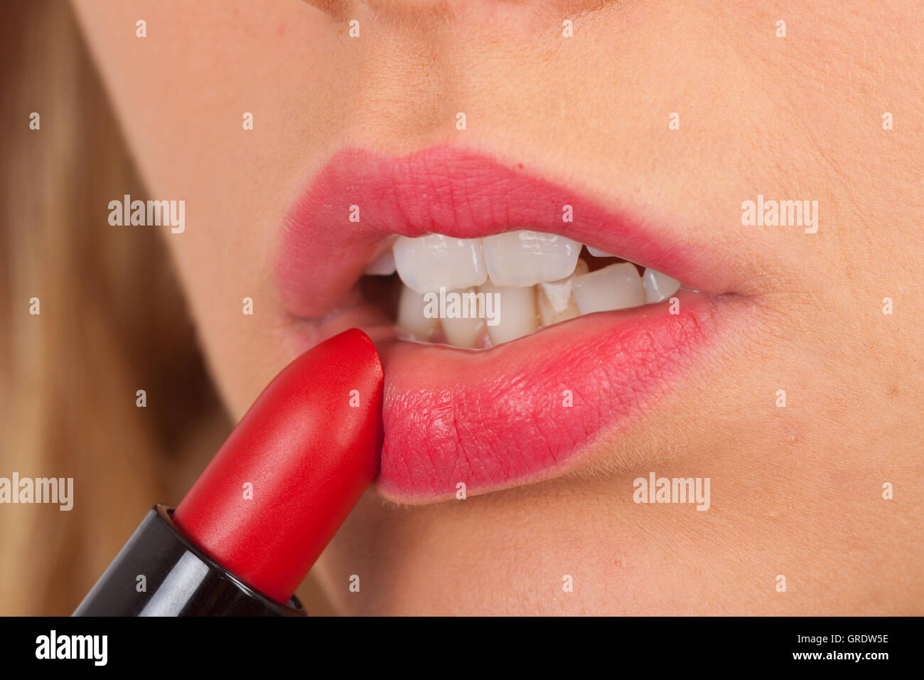 Woman S Mouth With Red Lipstick Up Close Stock Photo - Alamy