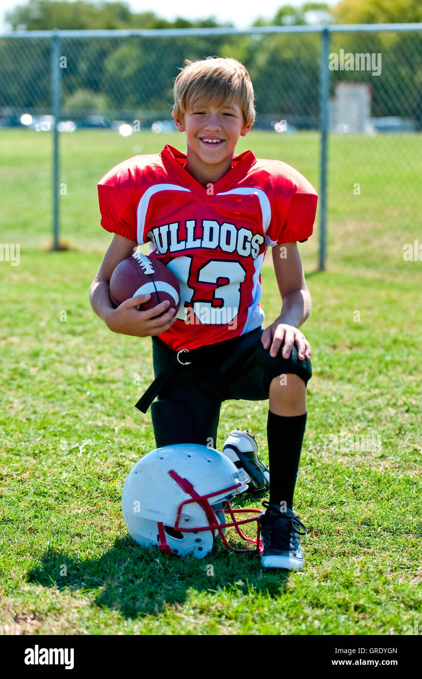 Happy youth football boy Stock Photo - Alamy