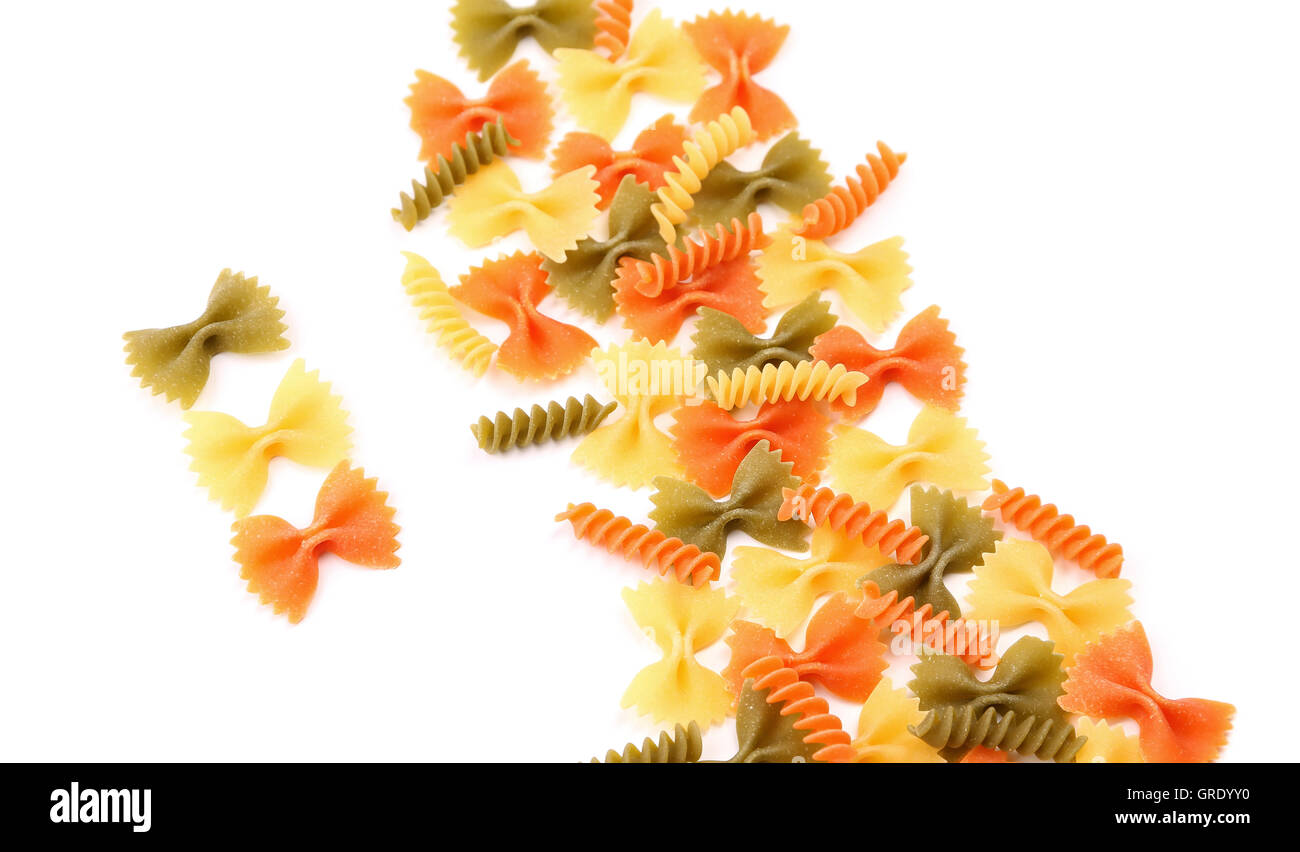 Different pasta in three colors Stock Photo - Alamy