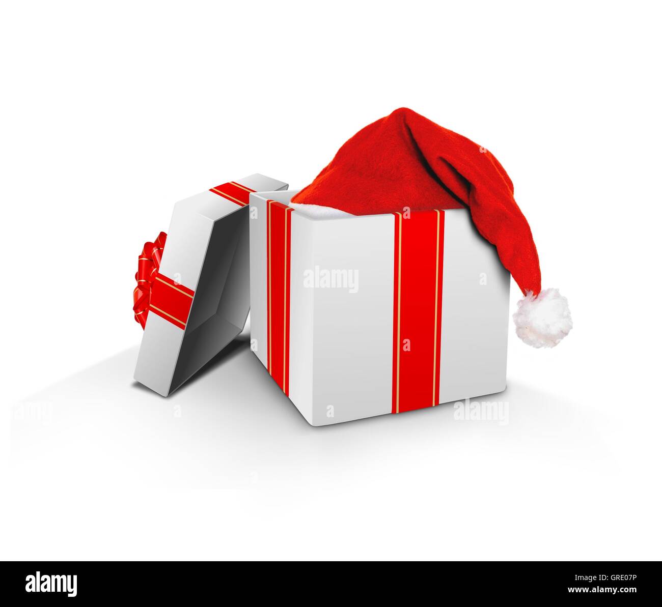 Christmas gift box and santa hat Stock Photo - Alamy