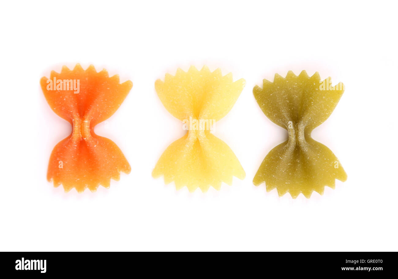 Farfalle pasta, isolated, three colors Stock Photo - Alamy