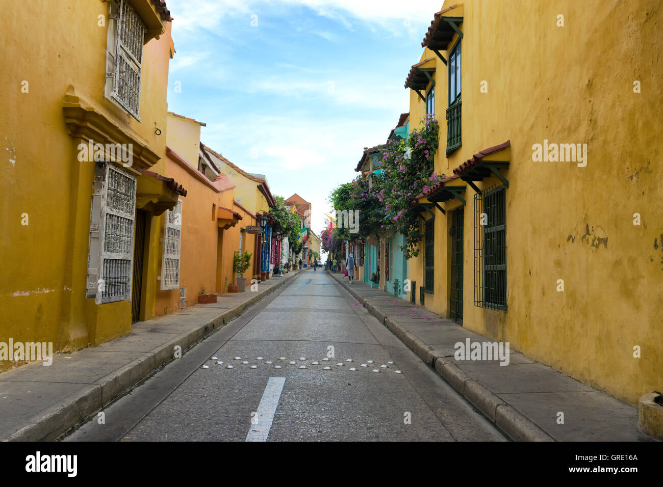 Looking down a street of historic colonial architecture in Cartagena ...