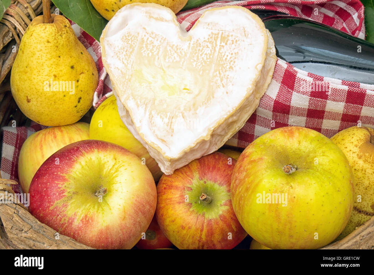 a Neufchatel cheese with Normandy apples Stock Photo - Alamy