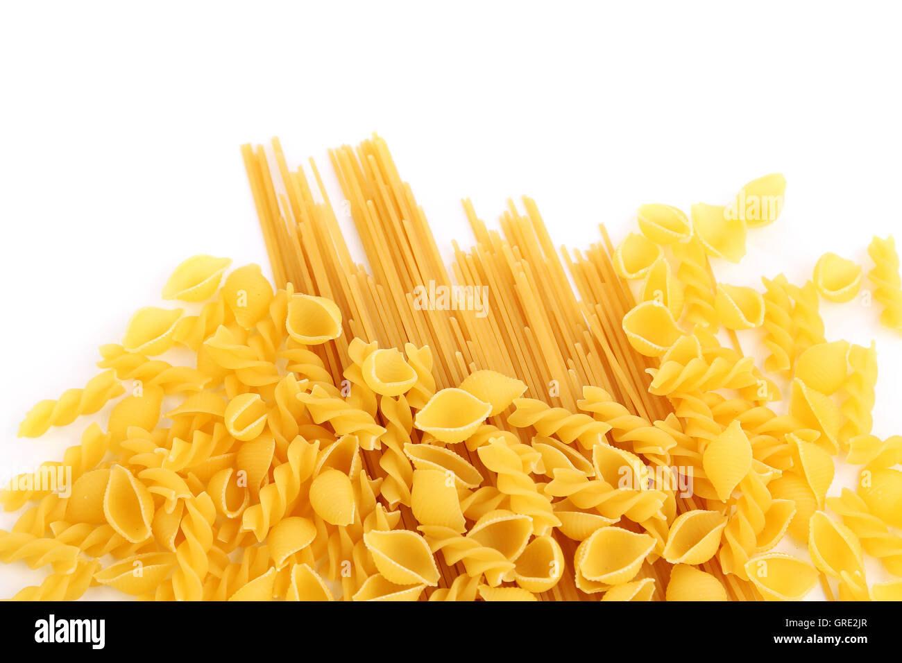 Yellow Italian pasta in different forms Stock Photo - Alamy