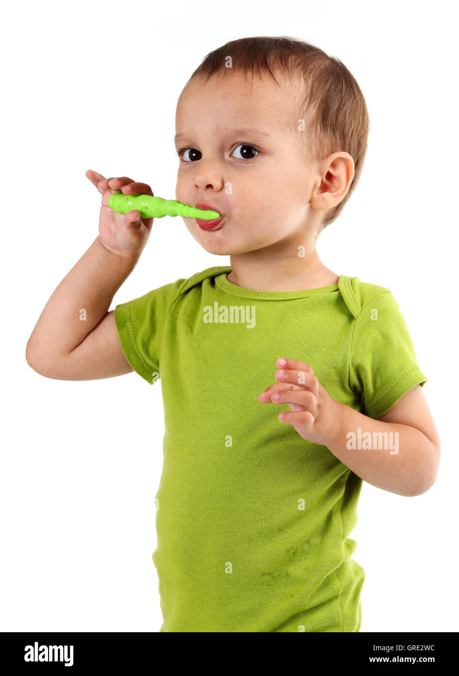 Cute little boy brushing teeth, isolated on white Stock Photo - Alamy