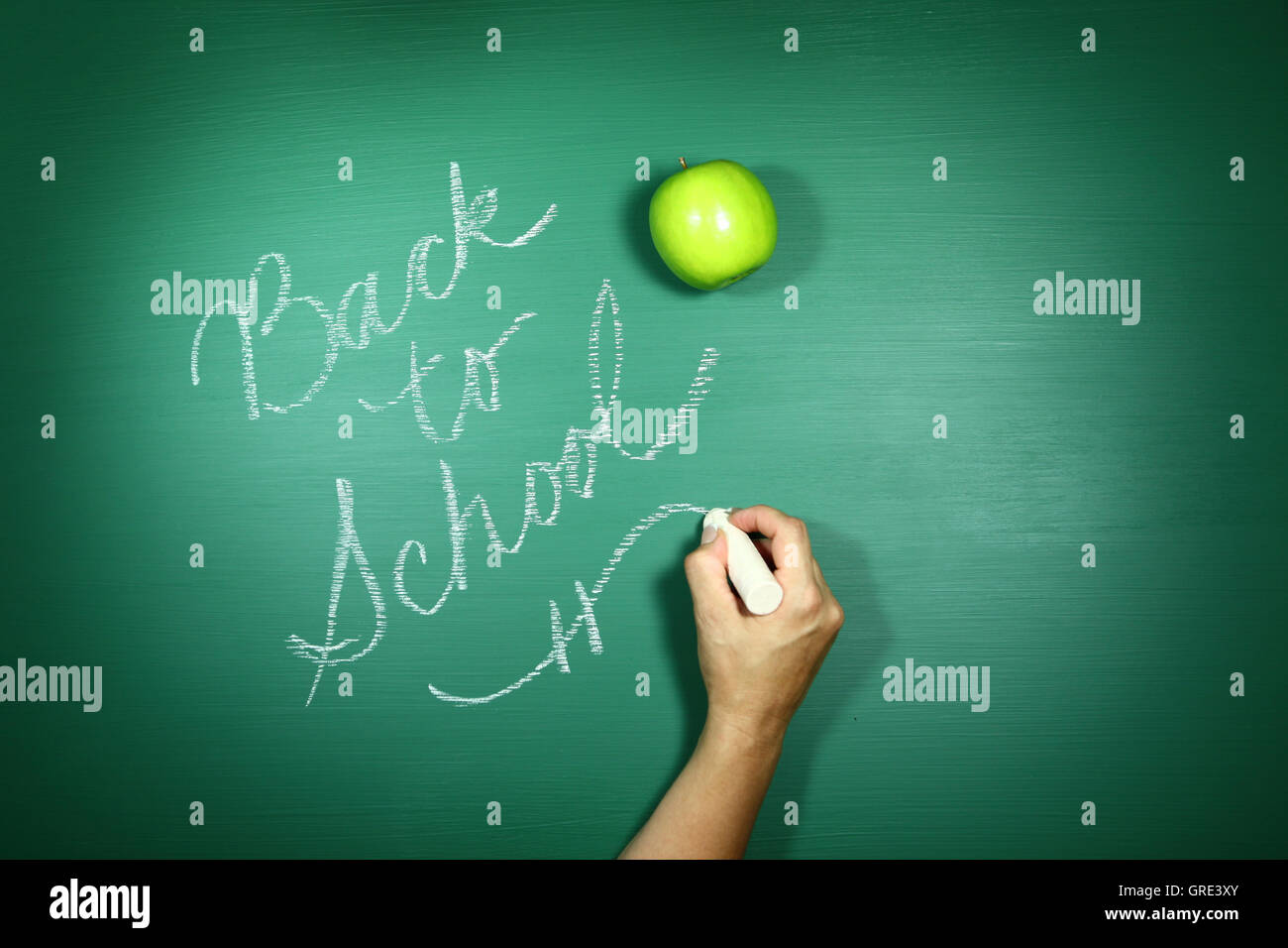 Back to School Written on a Chalkboard Stock Photo - Alamy