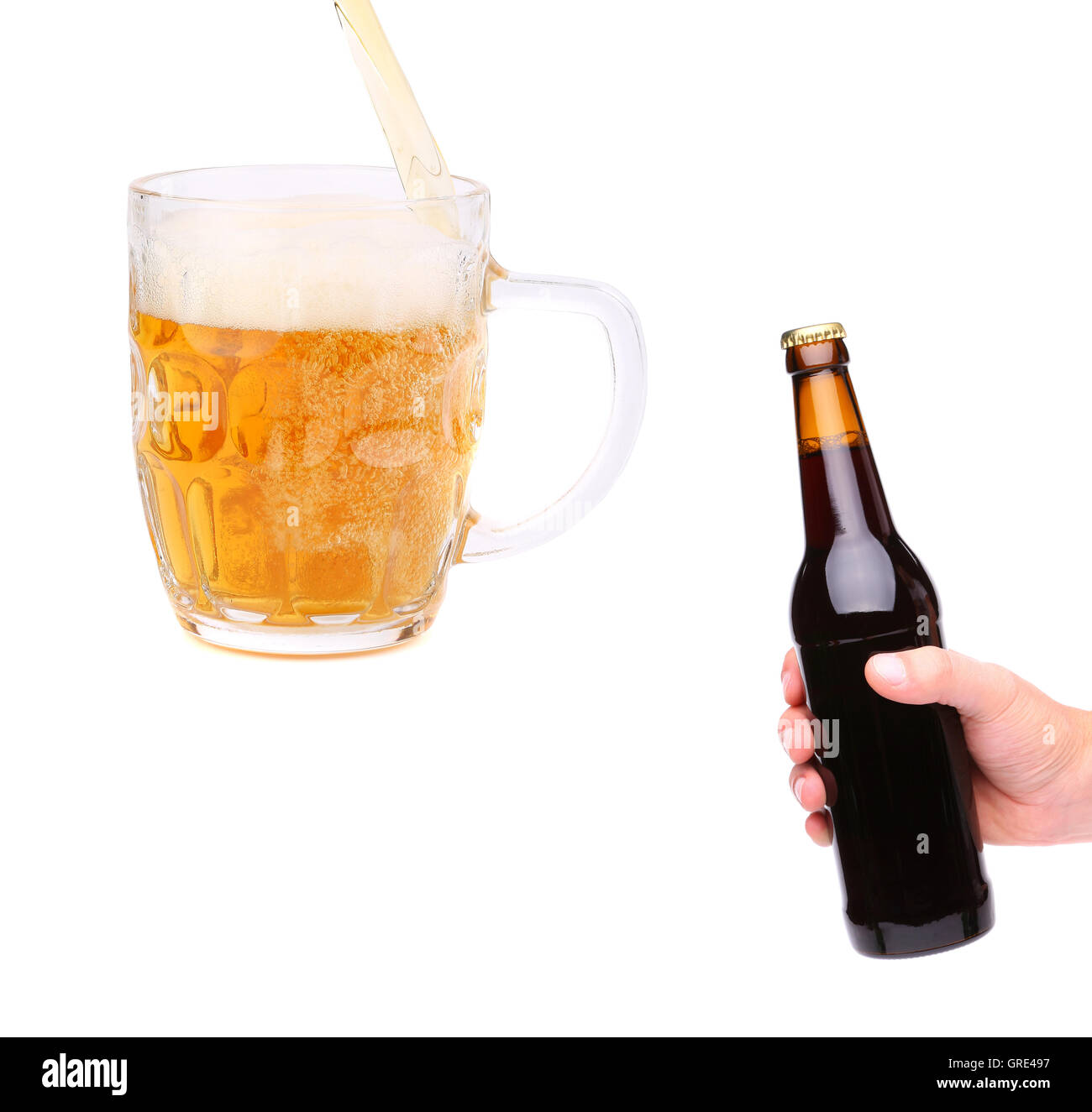 Hand, stream, glass and bottle of beer Stock Photo - Alamy