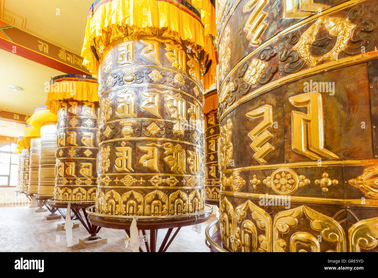 Buddhist prayer wheels Stock Photo - Alamy