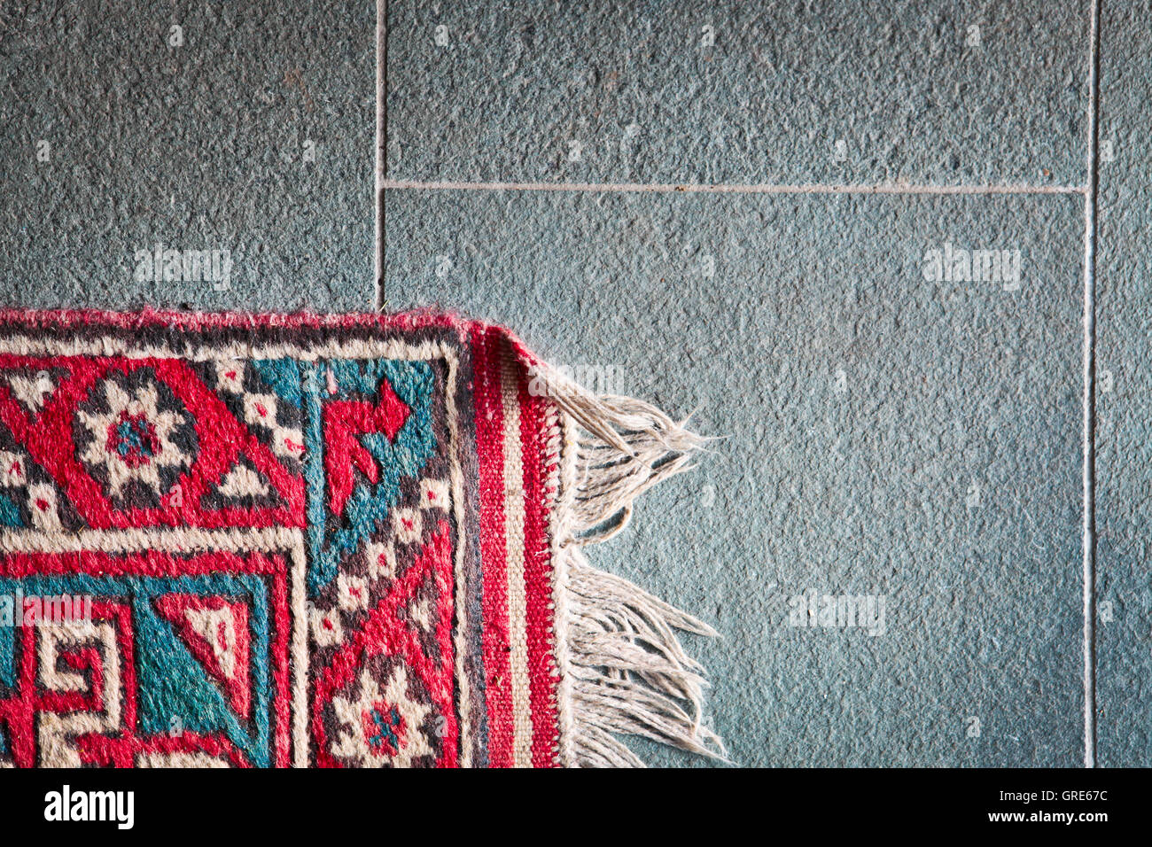 Corner of rug Stock Photo - Alamy