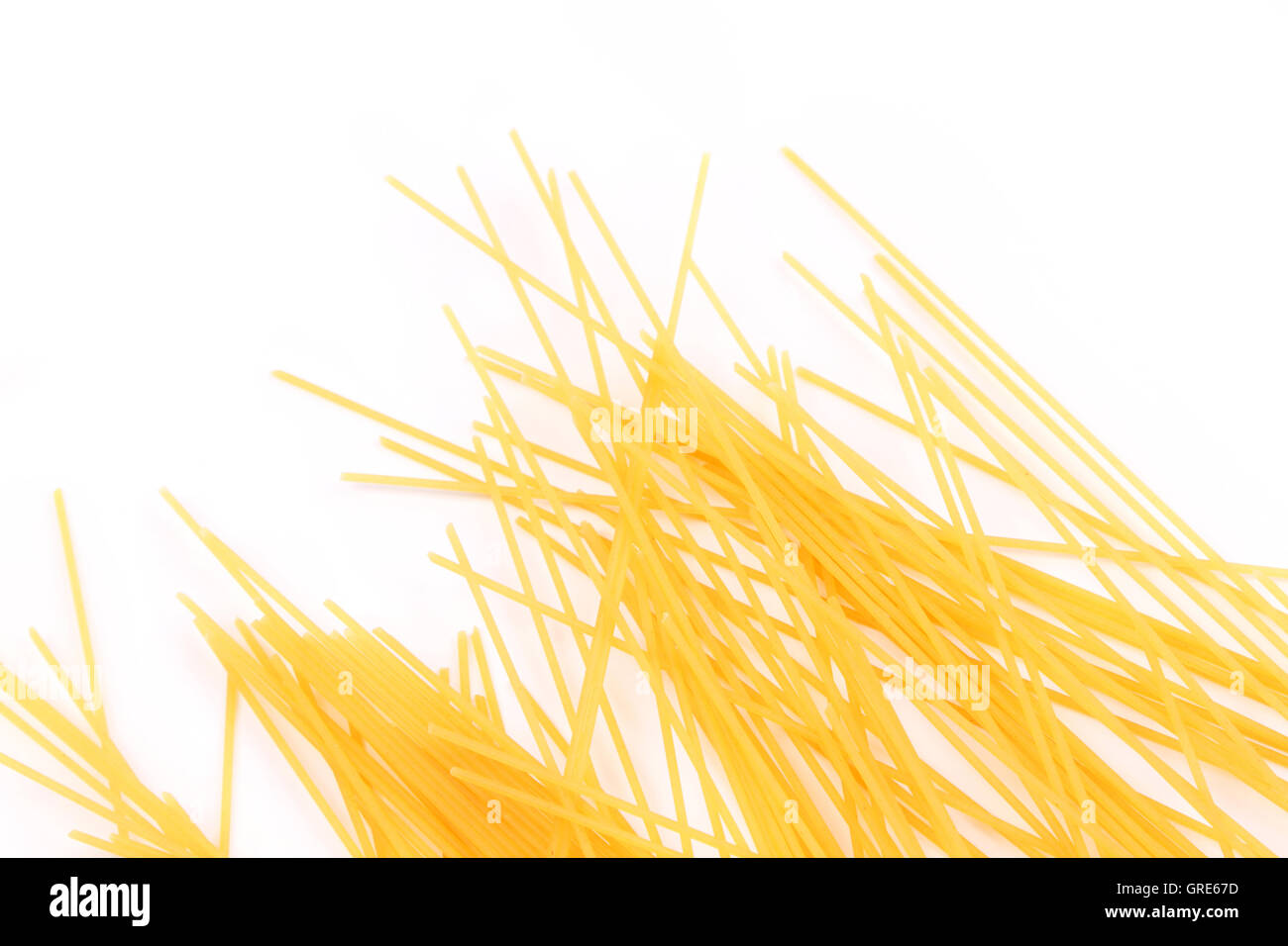Uncooked italian spaghetti mesh Stock Photo - Alamy