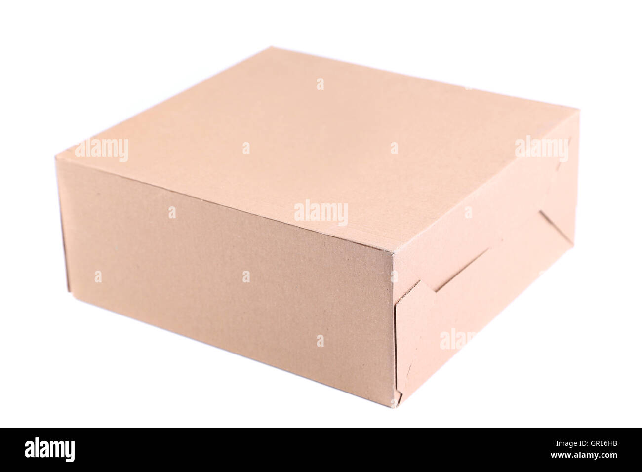Closed shipping cardboard box isolated on white Stock Photo - Alamy