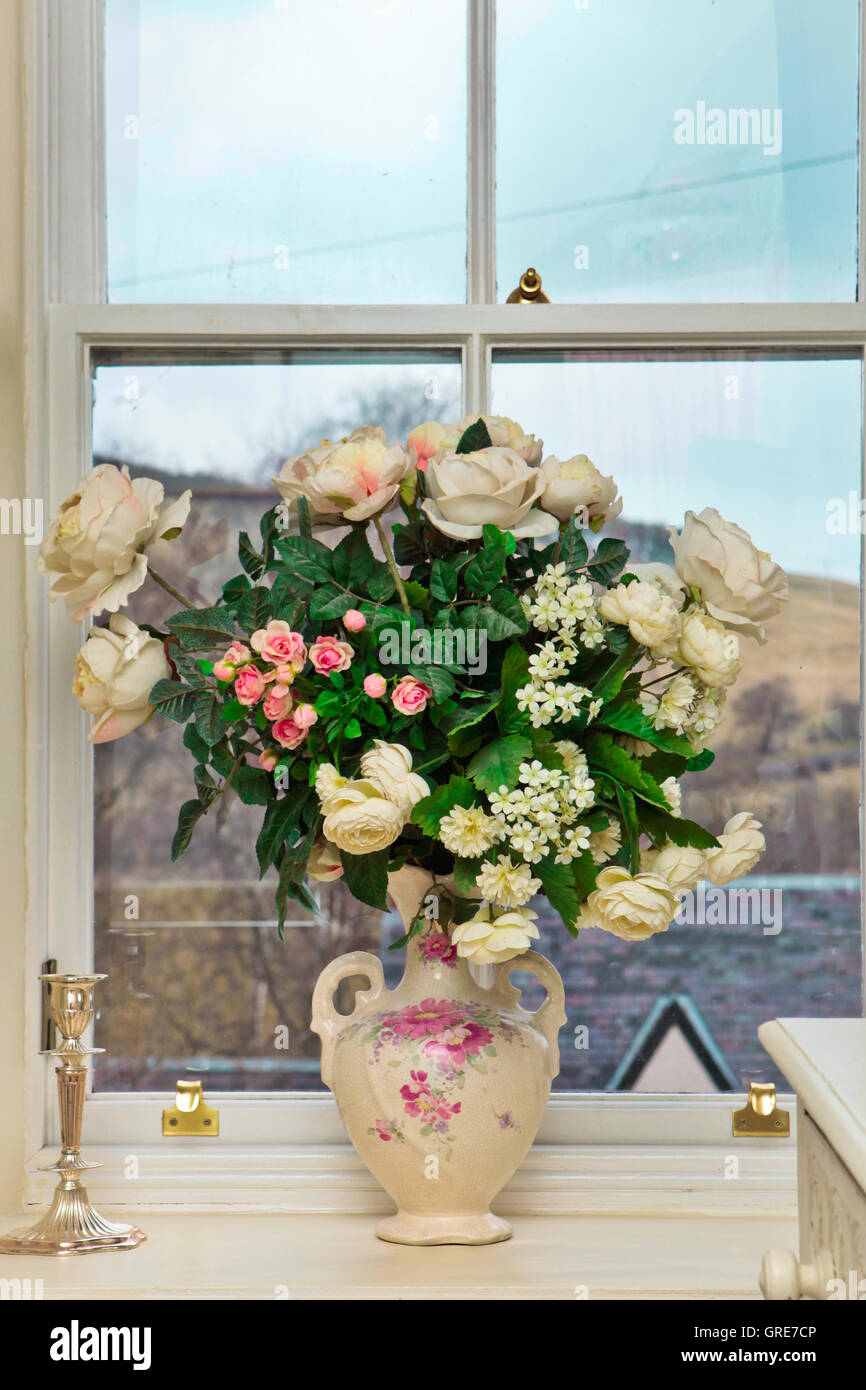 Flowers in the window Stock Photo - Alamy