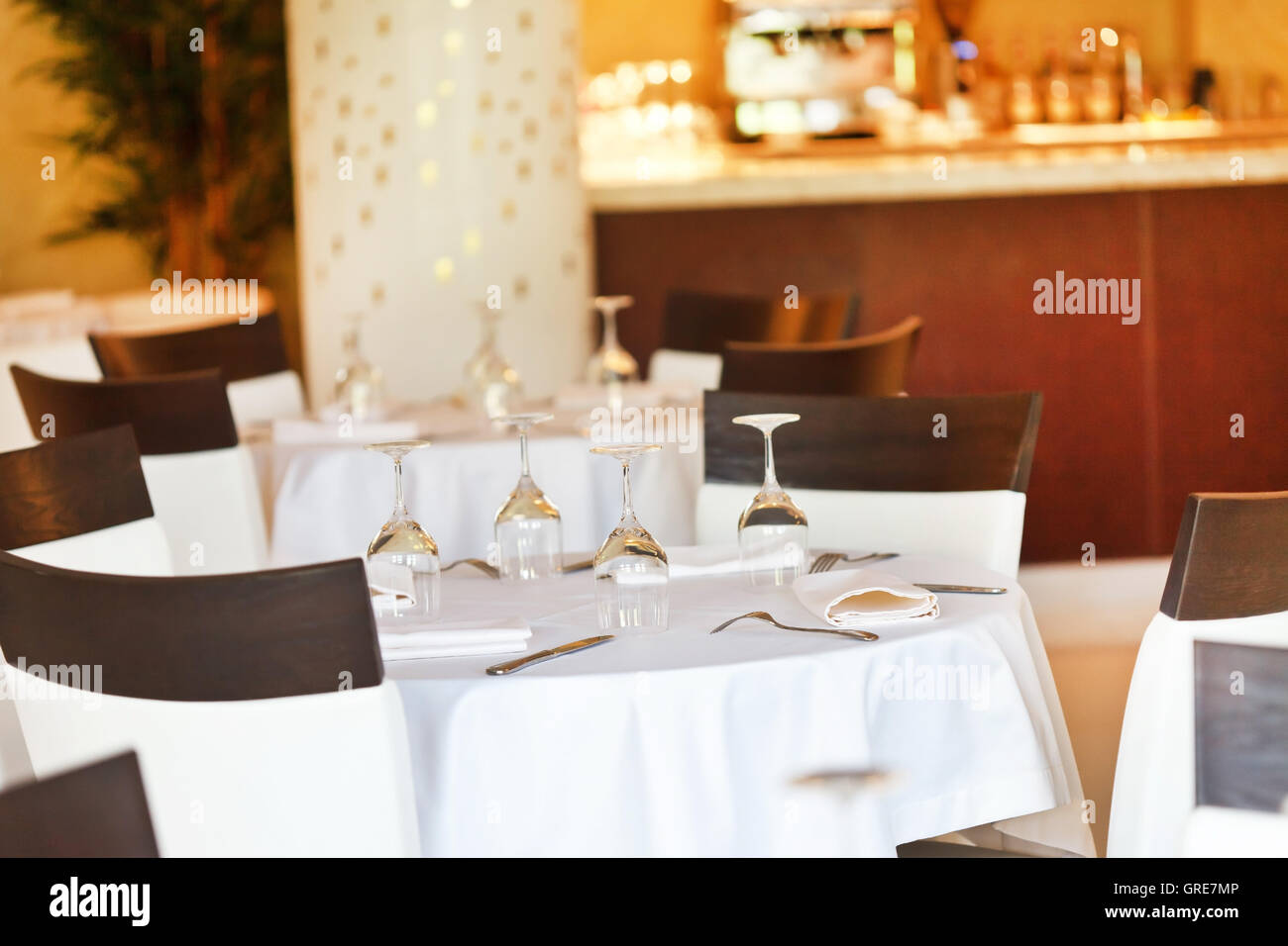 Tables set for meal Stock Photo - Alamy